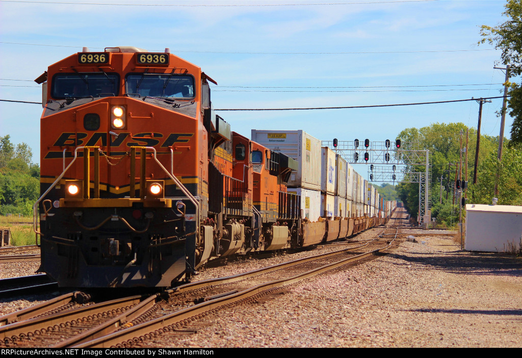 BNSF 6936 crosses over from main #1 to main #2.